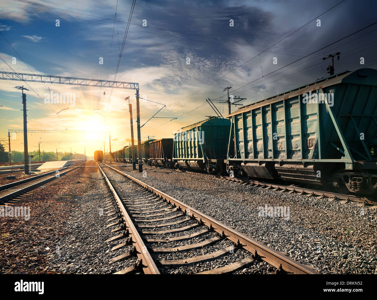 Freight train wagons at the station in the evening Stock Photo ...