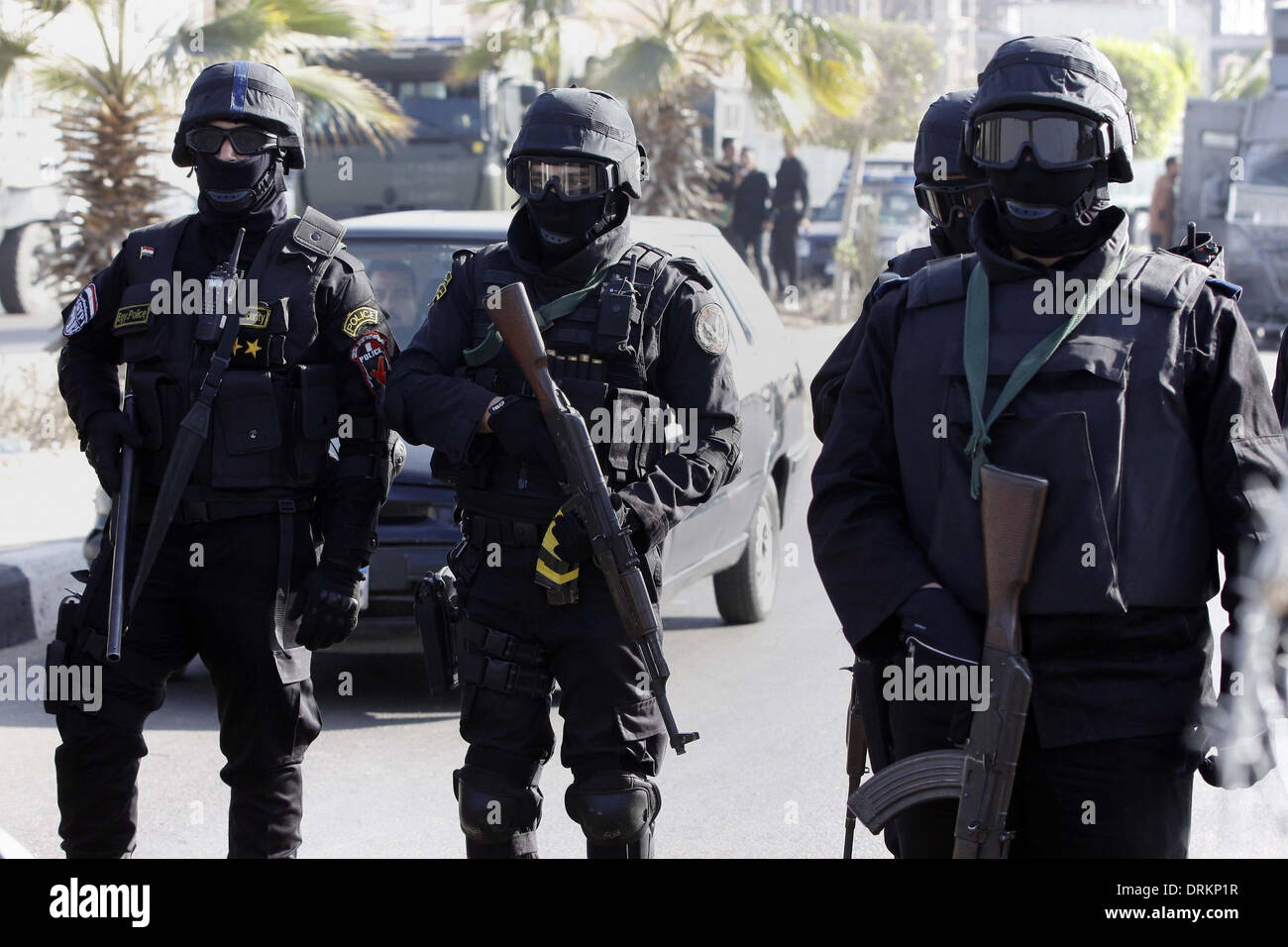 Cairo, Cairo, Egypt. 28th Jan, 2014. Police and security forces stand ...