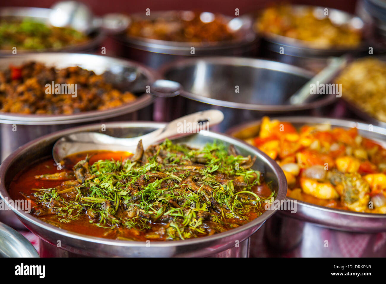 Burmese dishes at a typical restaurant in Yangon, Myanmar Stock Photo ...
