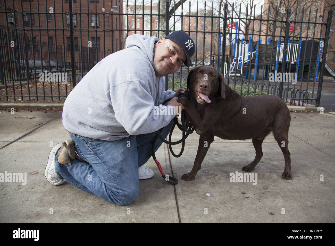 Man dog street hi-res stock photography and images - Alamy