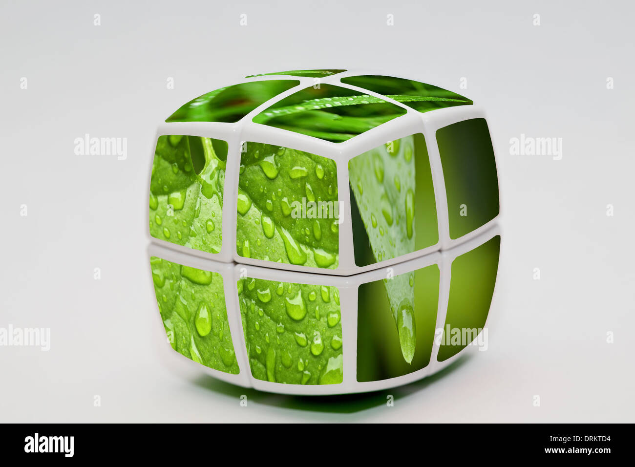 Green drops rubik cube Stock Photo - Alamy