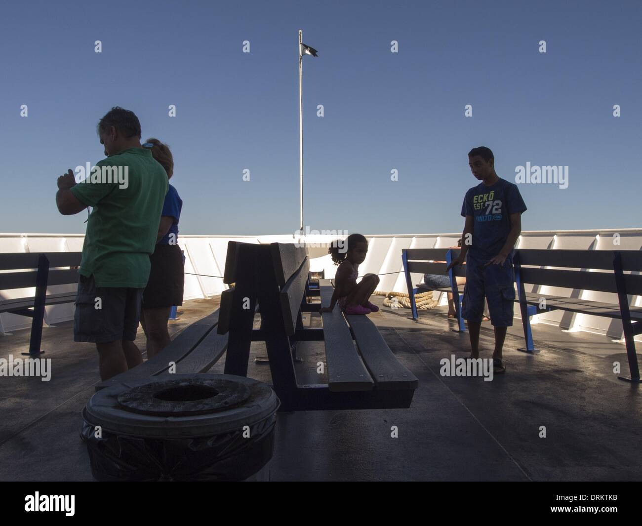 Block Island, Rhode Island, USA. 11th Aug, 2013. Silhouette of people ...