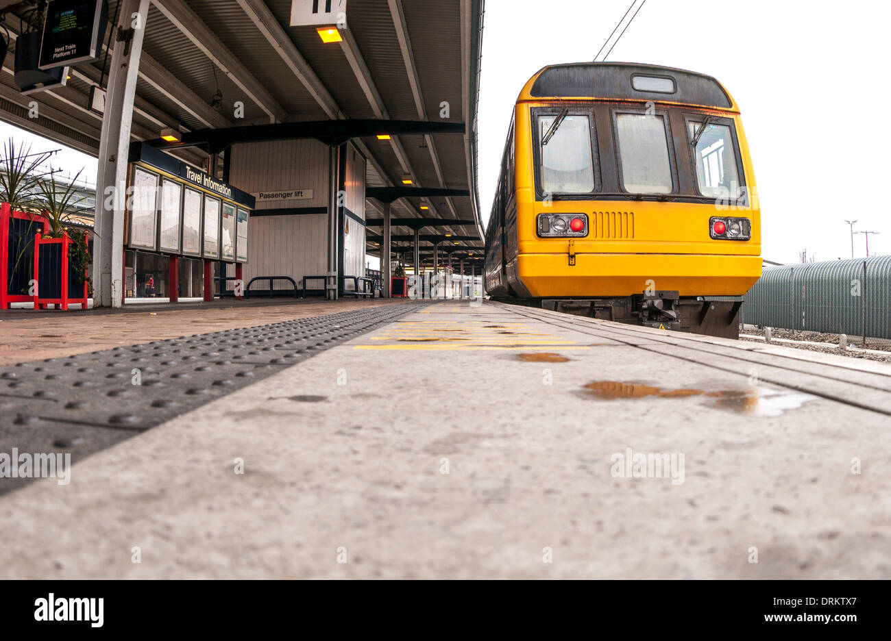 Train at platform shot from a low angle Stock Photo - Alamy