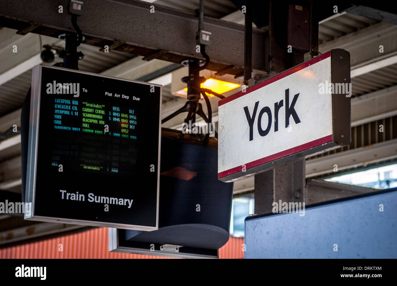Arrival and Departure train summary screen and York sign at railway ...