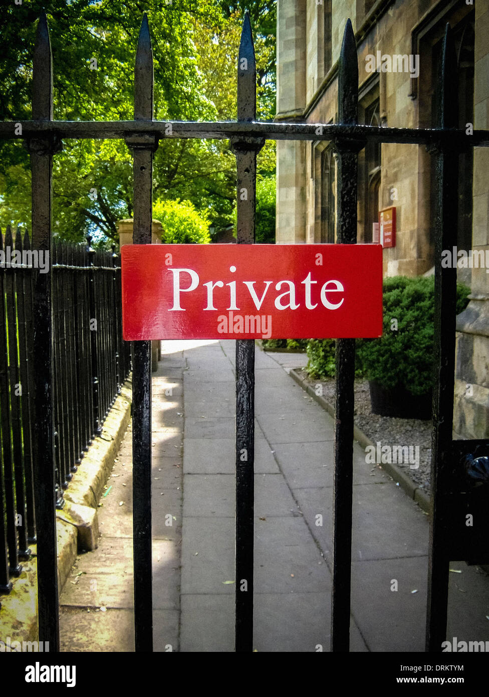 Private sign on wrought iron gate Stock Photo - Alamy