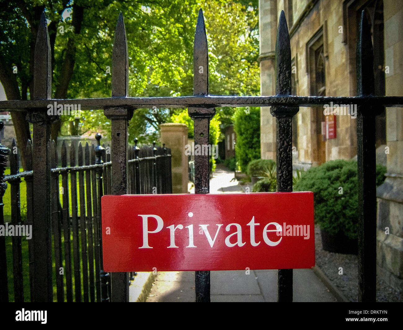 Private sign on wrought iron gate Stock Photo - Alamy
