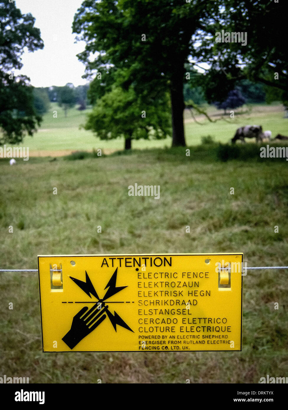Attention Electric Fence warning sign Stock Photo - Alamy