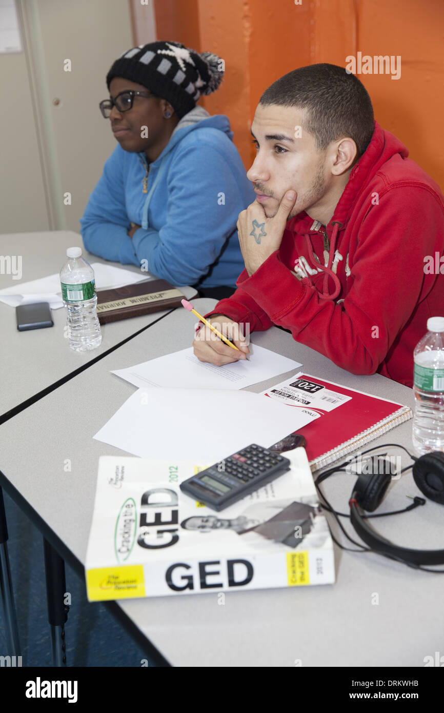 Young adults in a GED class at a community center in New York City ...