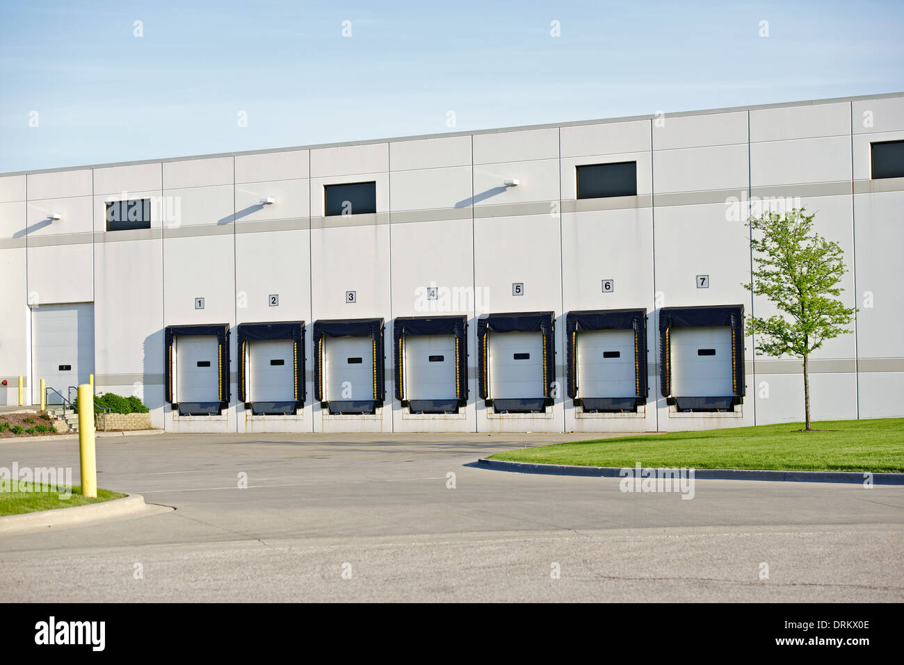 Truck Delivery Gates in the Warehouse. Business Park Photo. Business ...