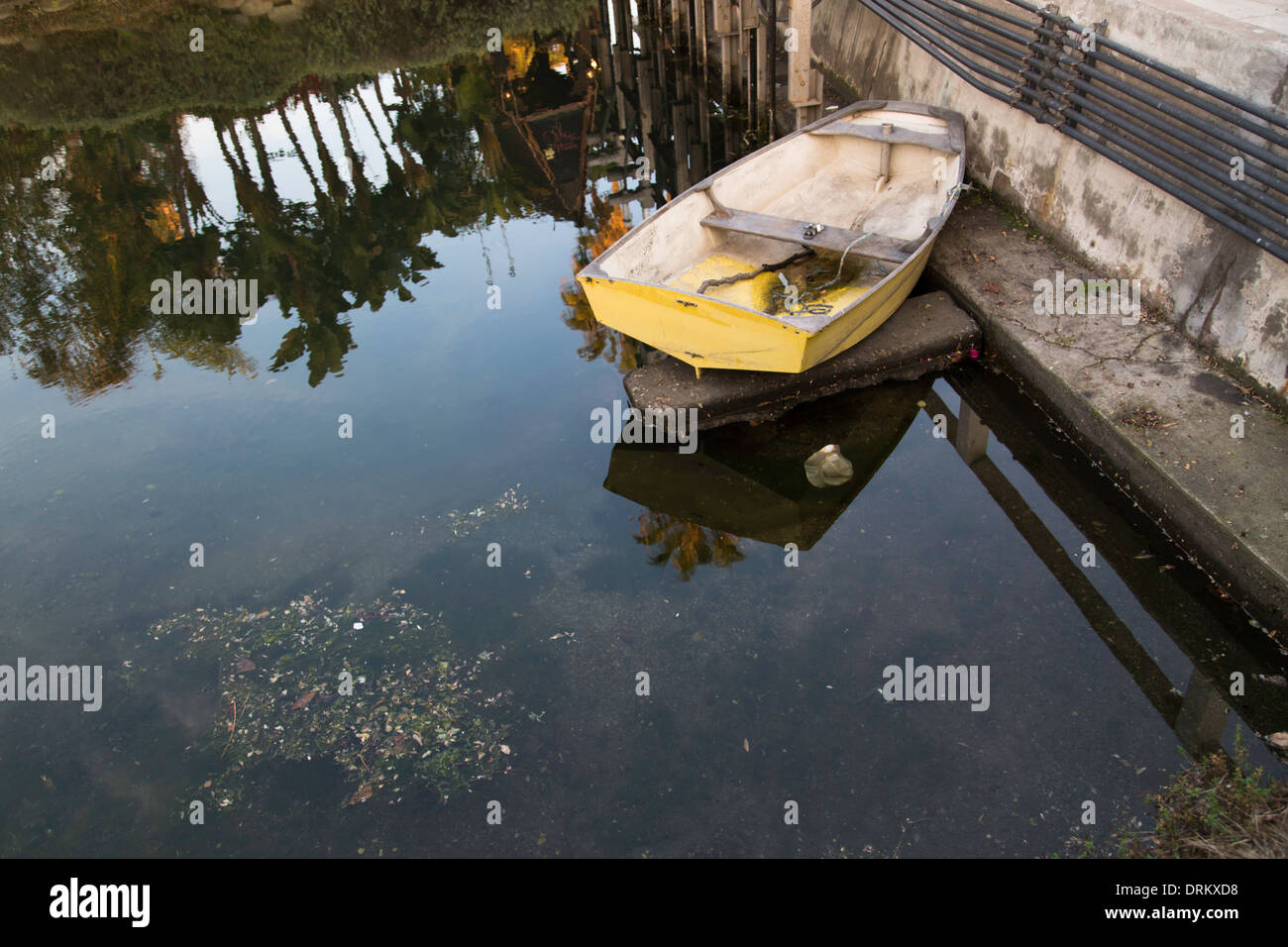 Empty rowboat in water hi-res stock photography and images - Alamy