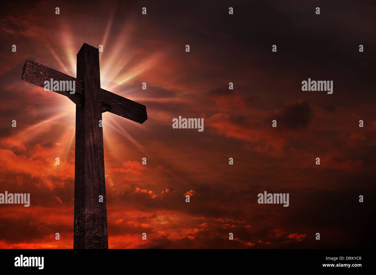 Crucifix in Sunset. Bright Light Above the Crucifix / Cross. Dark Red ...