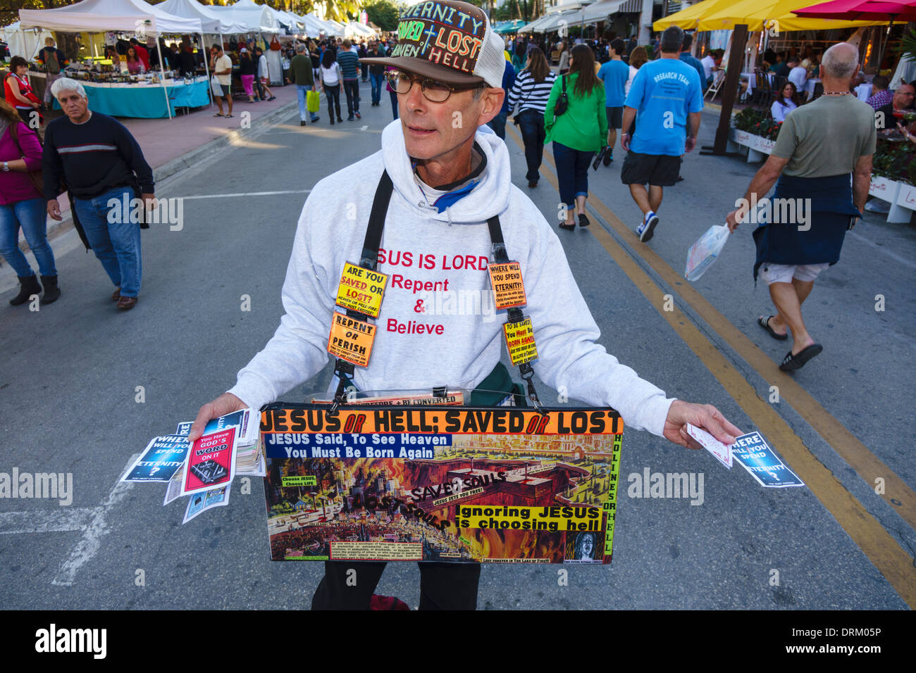 Handing out literature hi-res stock photography and images - Alamy