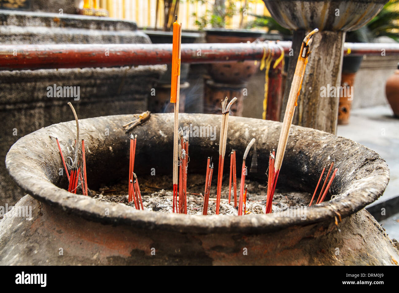 Incense burner in pot the ashes and smoke Stock Photo - Alamy