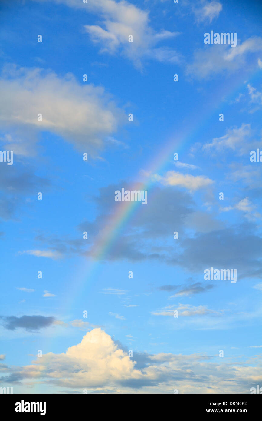 Rainbow blue sky white clouds hi-res stock photography and images - Alamy