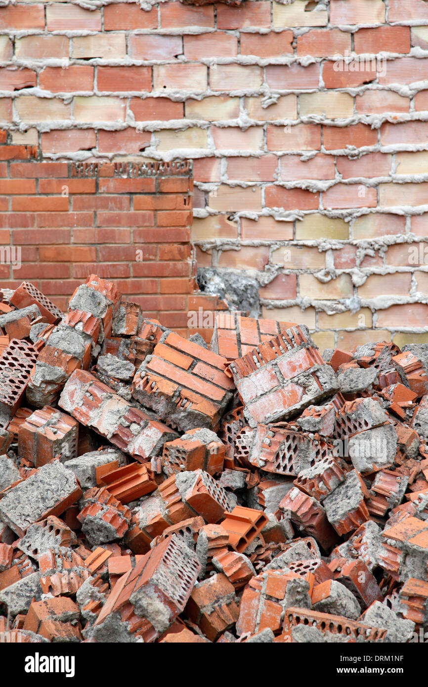 Spain, Catalonia, building site, heap of bricks at wall Stock Photo - Alamy