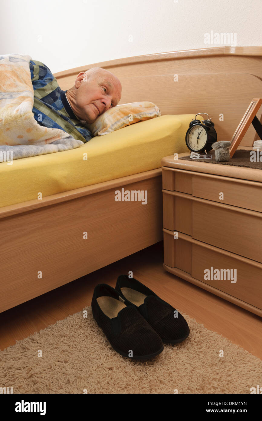 Old man awakening Stock Photo - Alamy