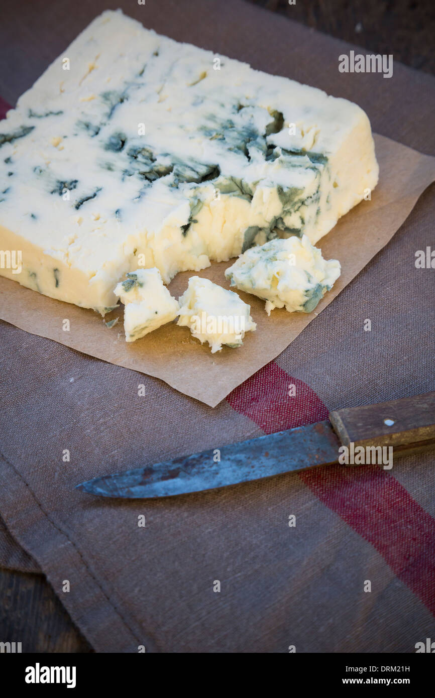 Piece of gorgonzola cheese on baking paper Stock Photo - Alamy
