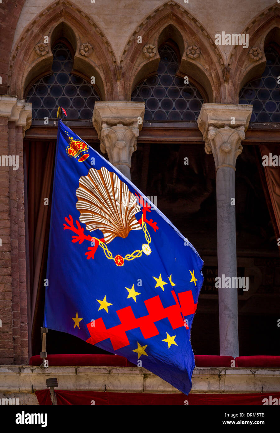 Siena on the day of the Palio horse race with flags and banners ...
