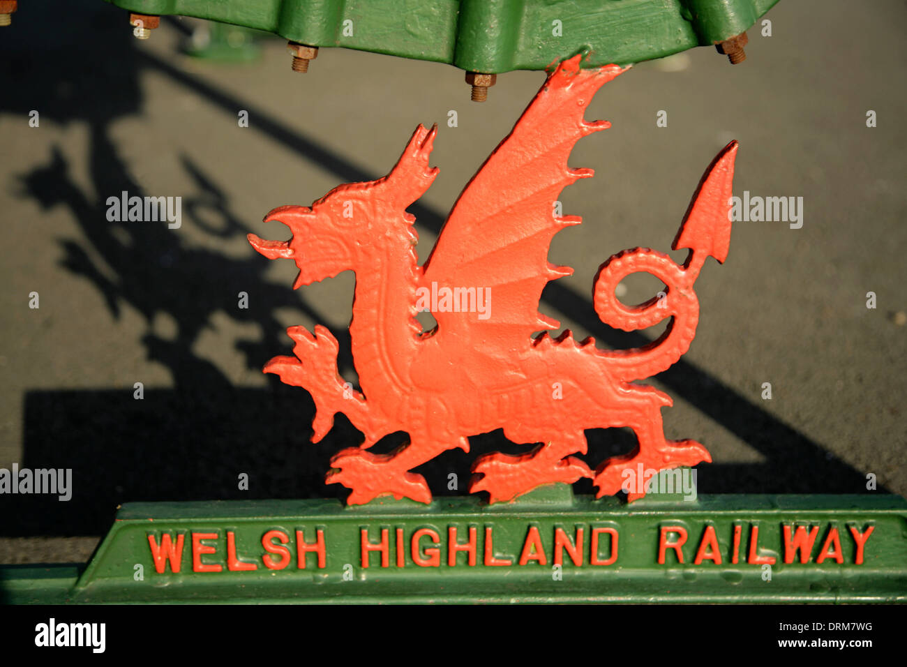 Welsh dragon in cast iron bench at Beddgelert railway station ...