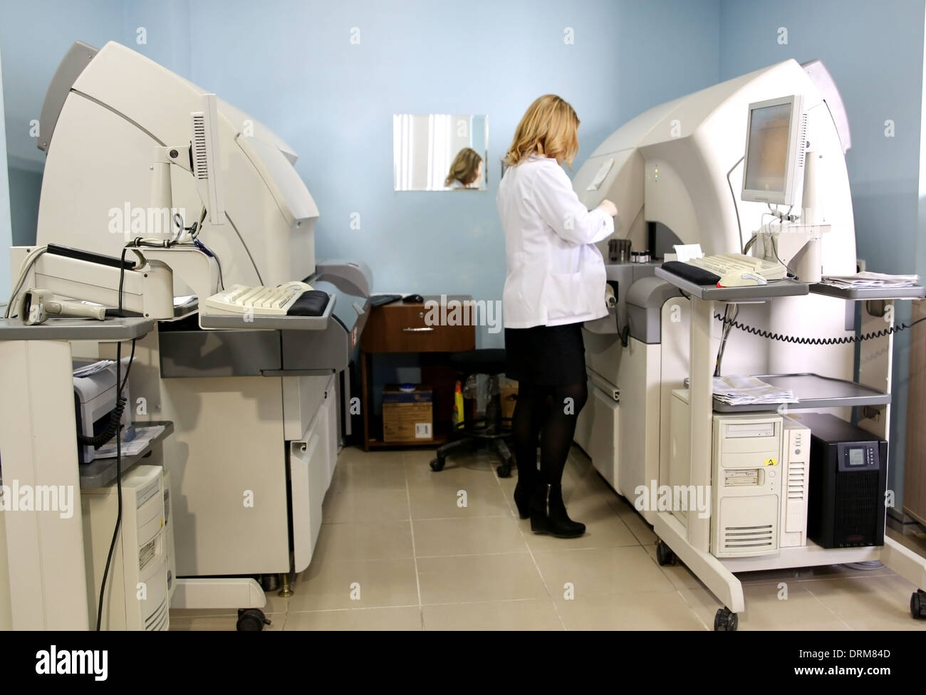 Scientist testing blood samples in laboratory Stock Photo - Alamy