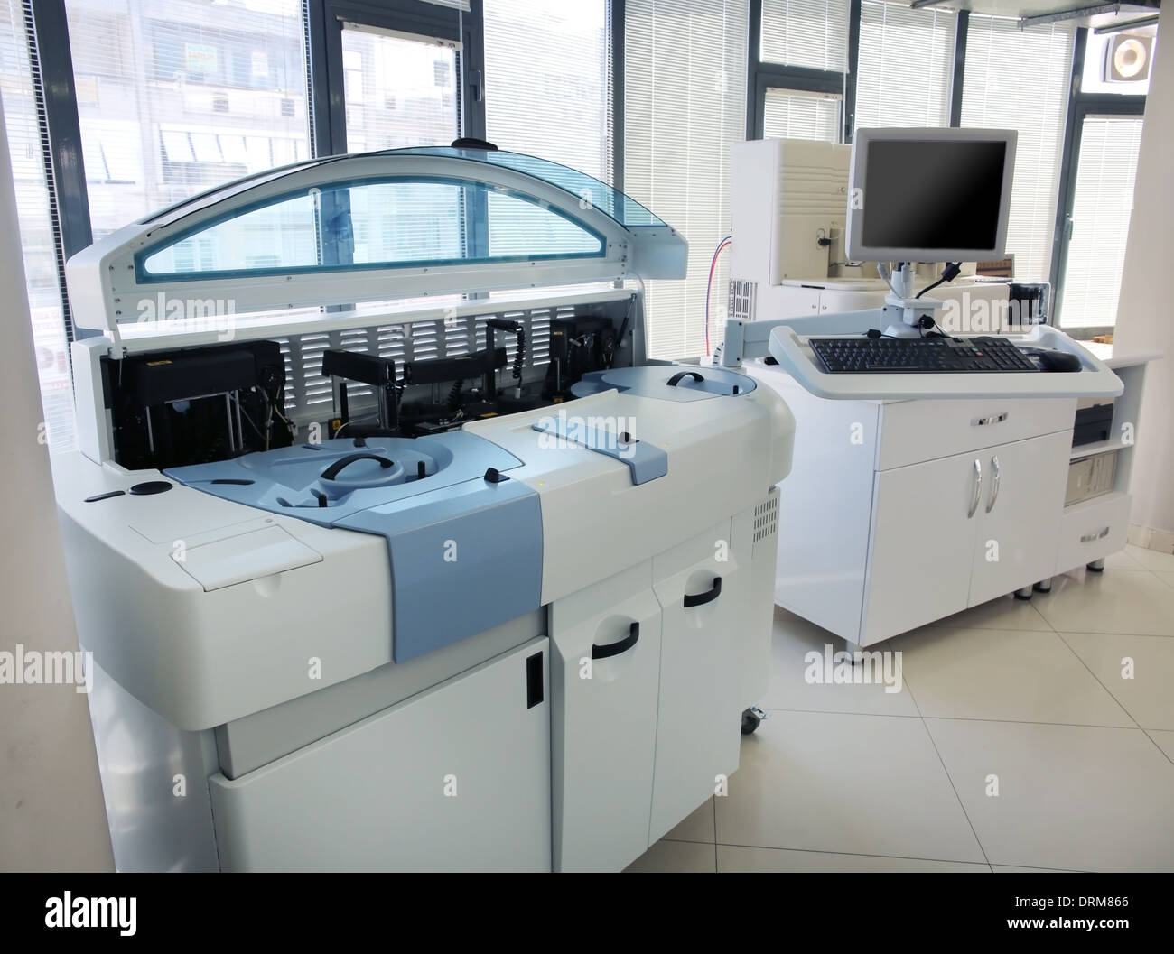 Testing blood samples in laboratory Stock Photo - Alamy