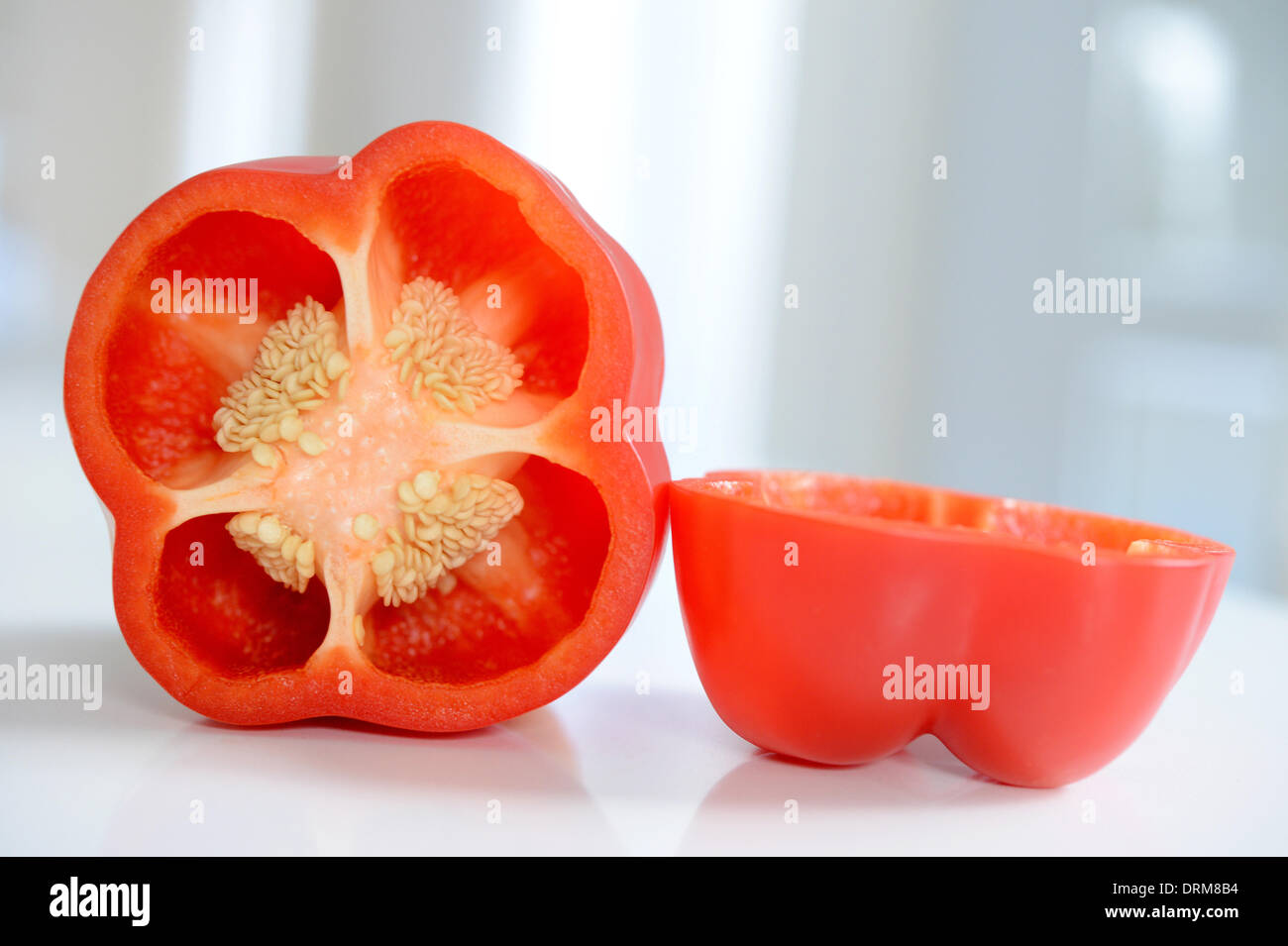 A half cut red pepper Stock Photo - Alamy