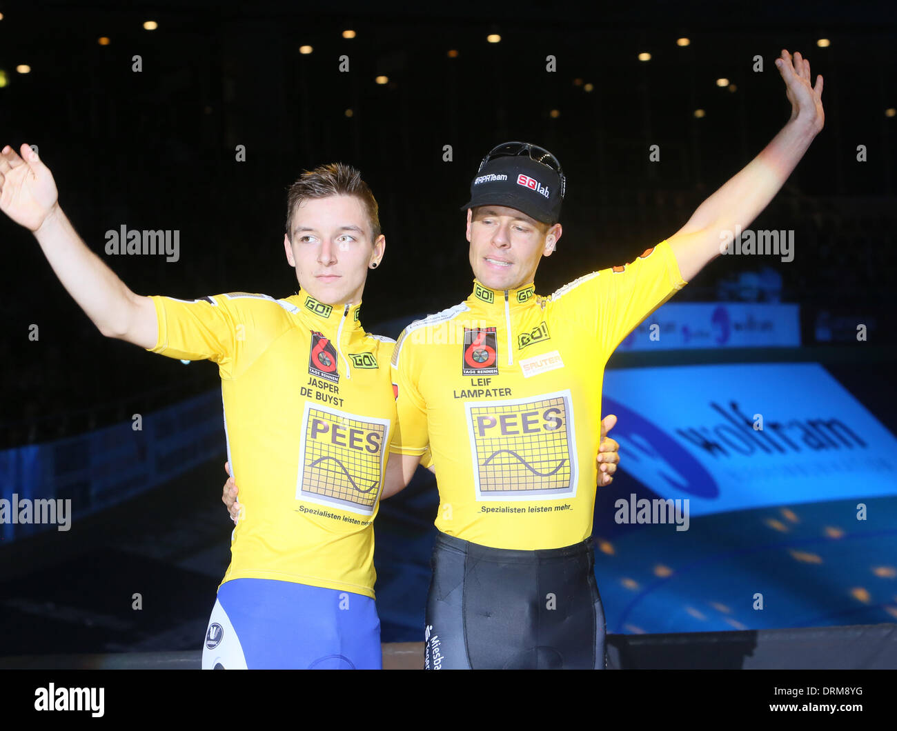 Berlin, Germany. 29th Jan, 2014. Cyclists Leif Lampater (R) and Jasper ...