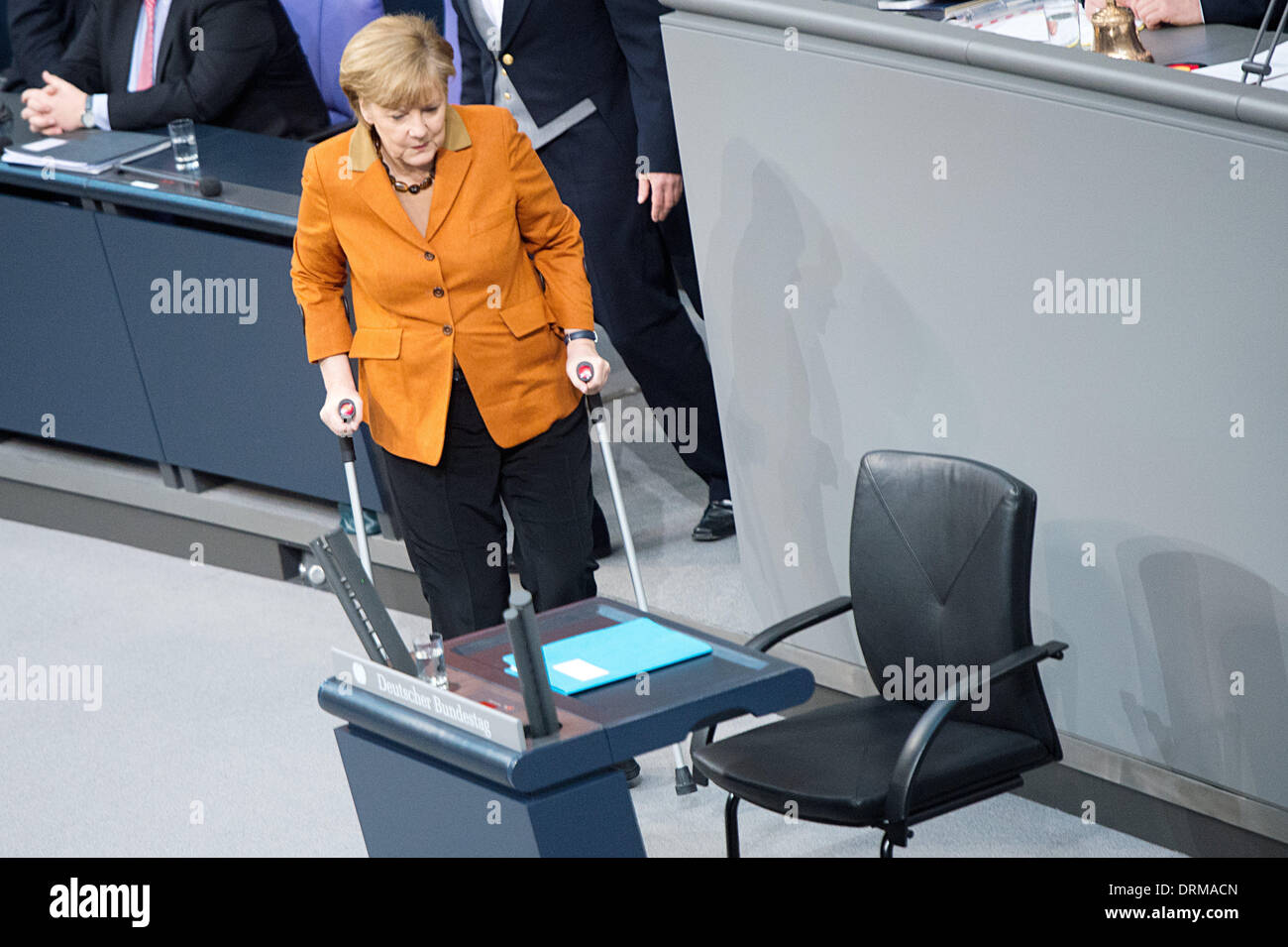 Berlin, Germany. 29th Jan, 2014. German Chancellor Angela Merkel walks ...