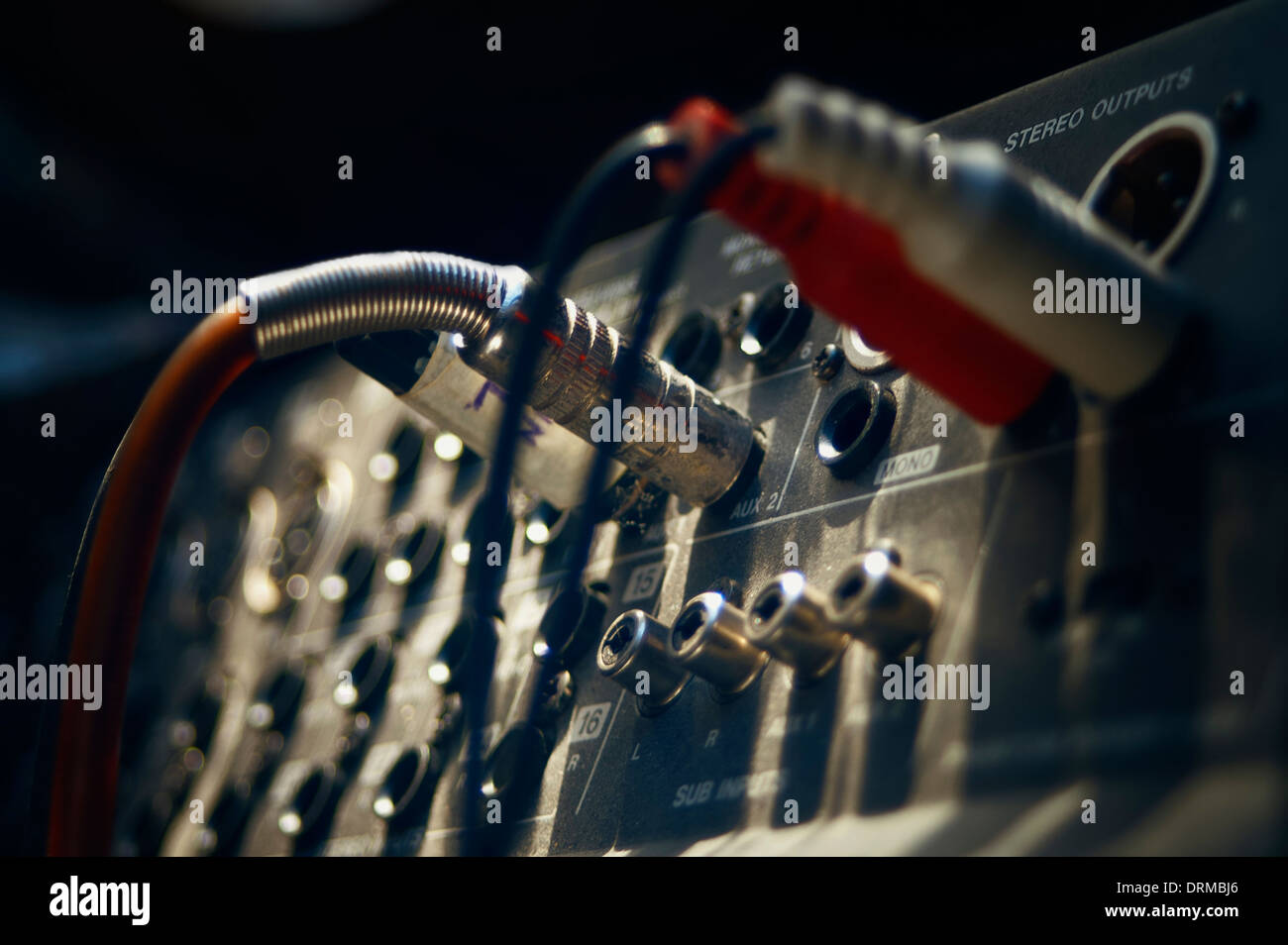 audio cable coming into analogue sound mixer in recording studio ...