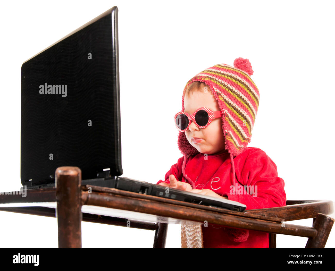 Little baby hacker typing on the laptop computer,isolated on white ...