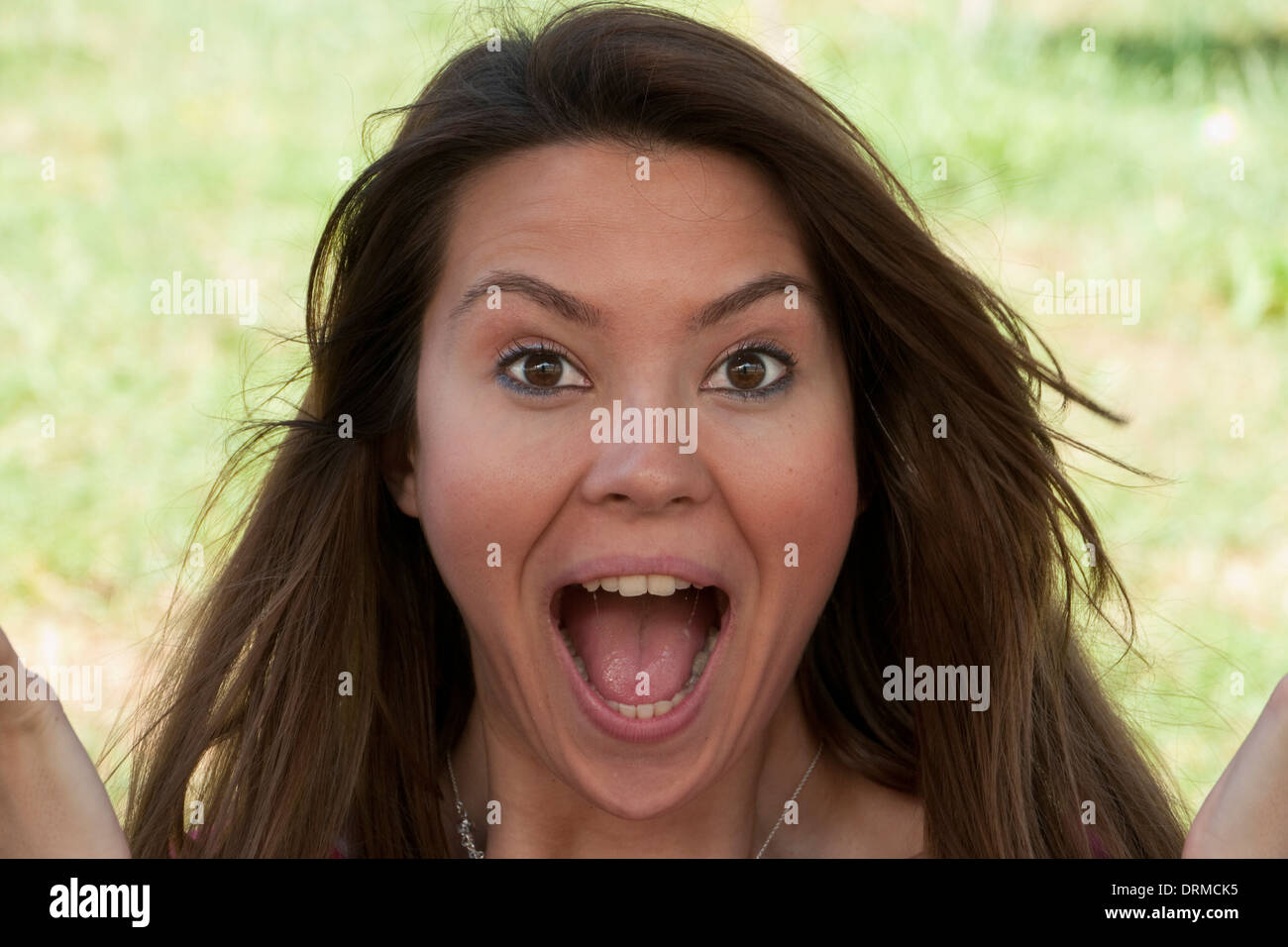 Surprised young woman making faces hi-res stock photography and images - Alamy