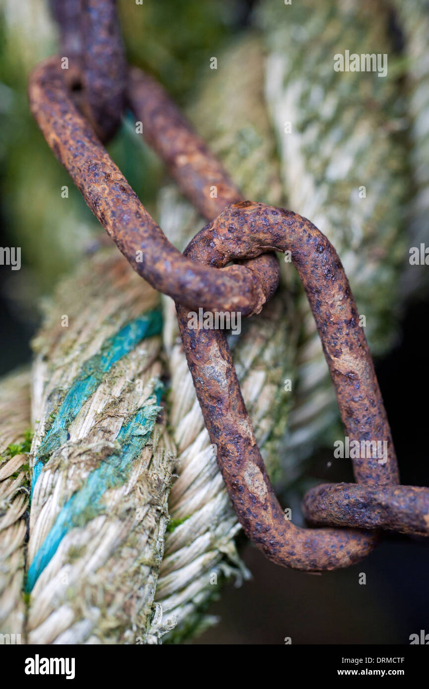 rusting chain and worn rope Stock Photo - Alamy