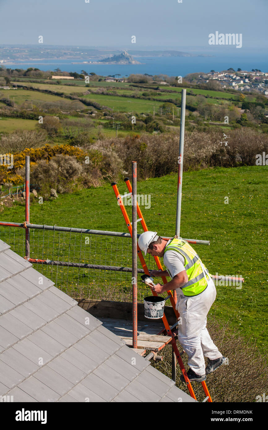 Construction worker climbing scaffolding hi-res stock photography and ...