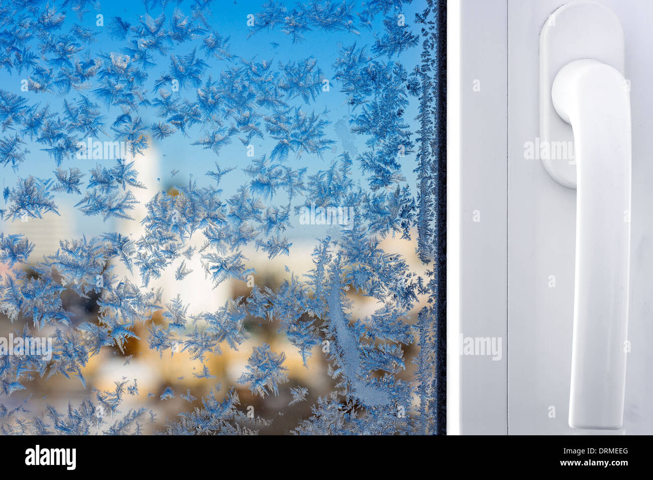 Winter patterns on window glass Stock Photo - Alamy