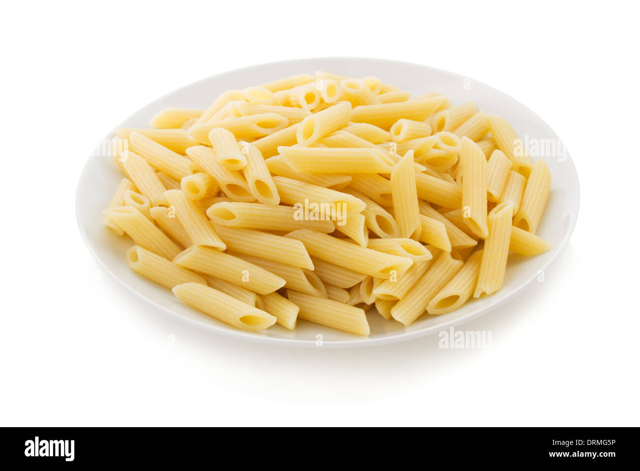pasta Penne in plate isolated on white background Stock Photo - Alamy