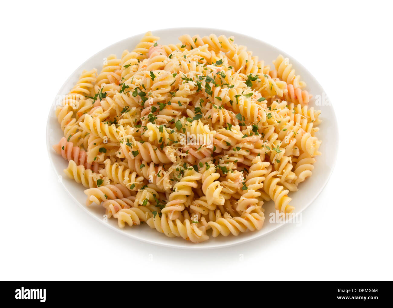 pasta fusilli in plate isolated on white background Stock Photo - Alamy