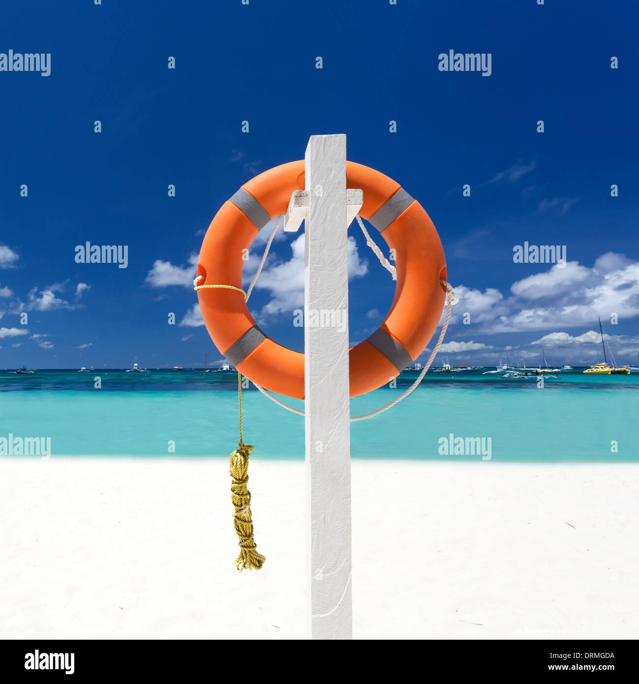 Lifebuoy ring on tropical beach Stock Photo - Alamy