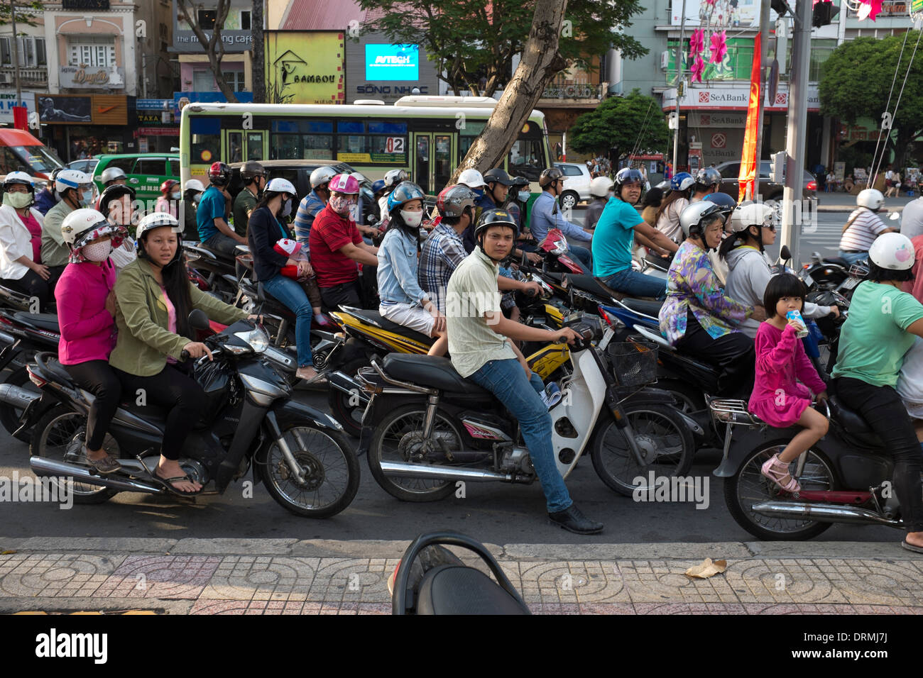 Motorcycle Traffic downtown Saigon Stock Photo - Alamy