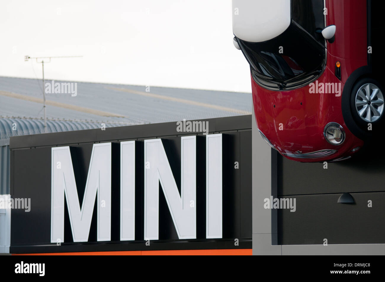 A mini attached to the front of a Mini car dealership Stock Photo - Alamy