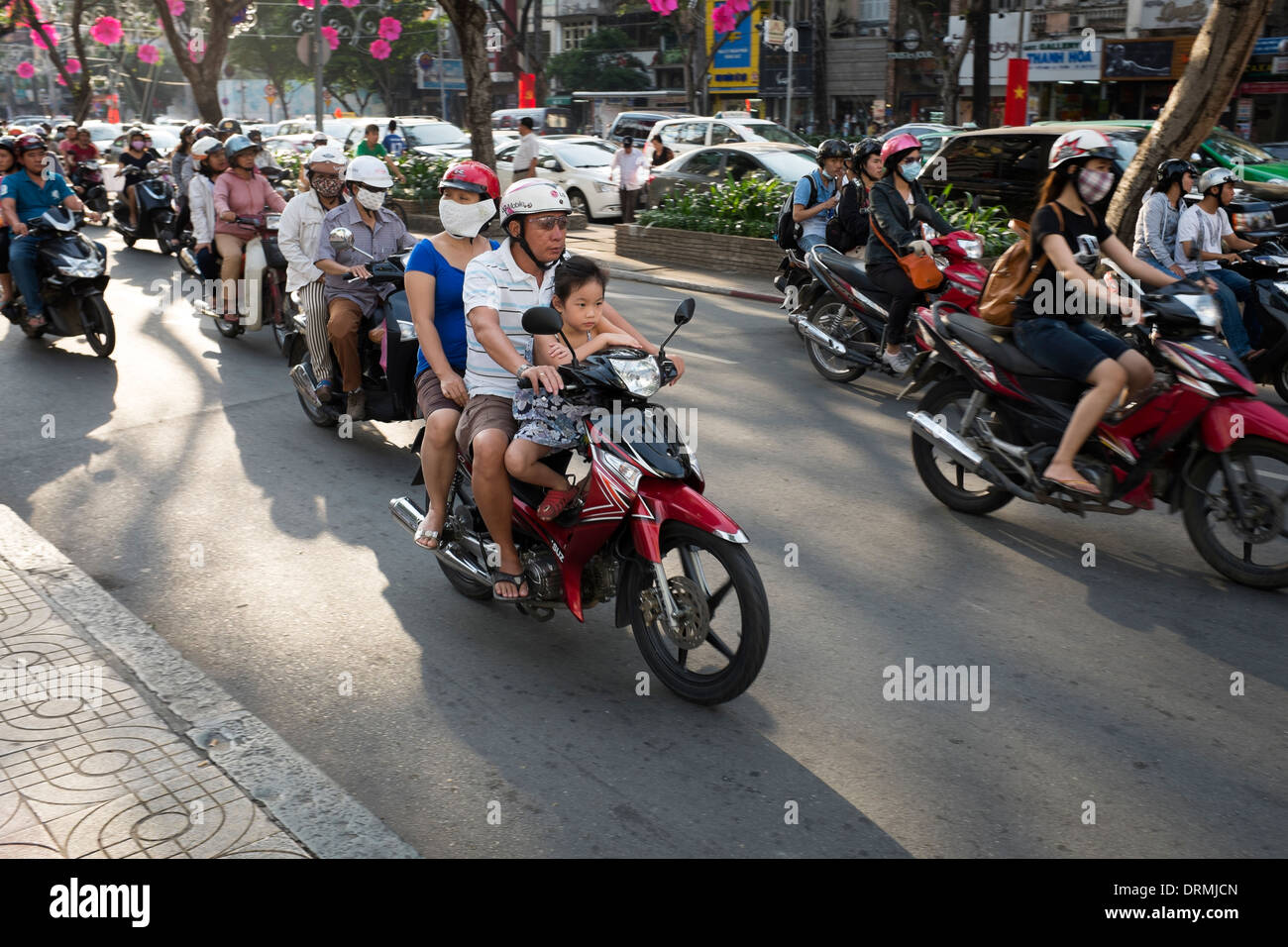 Motorcycle Traffic downtown Saigon Stock Photo - Alamy