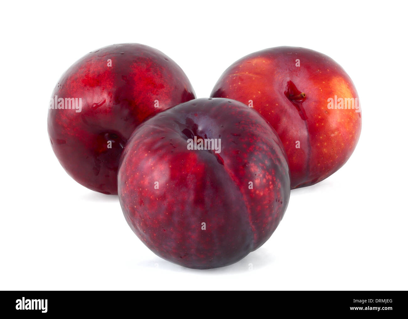 Three whole red plums hi-res stock photography and images - Alamy