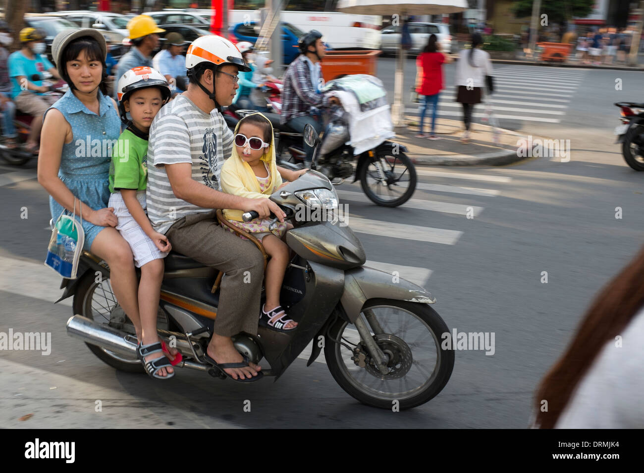 Family riding moped hi-res stock photography and images - Alamy