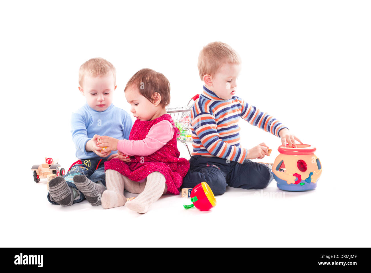 Three children play Stock Photo - Alamy