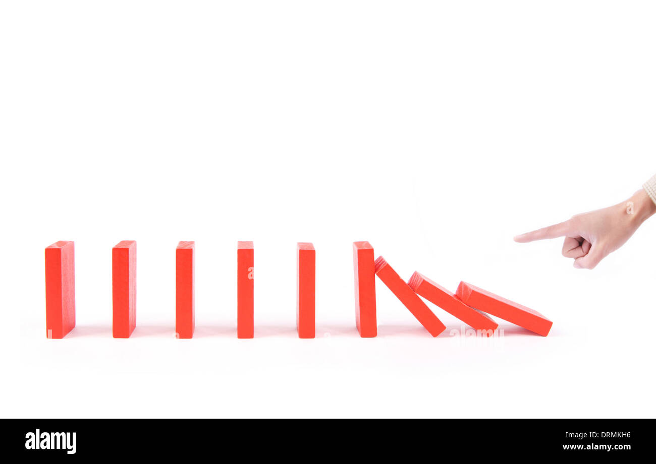 Finger pushing dominoes hi-res stock photography and images - Alamy