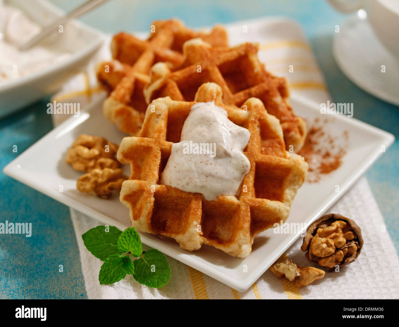 Walnut waffles with cinnamon. Recipe available Stock Photo - Alamy