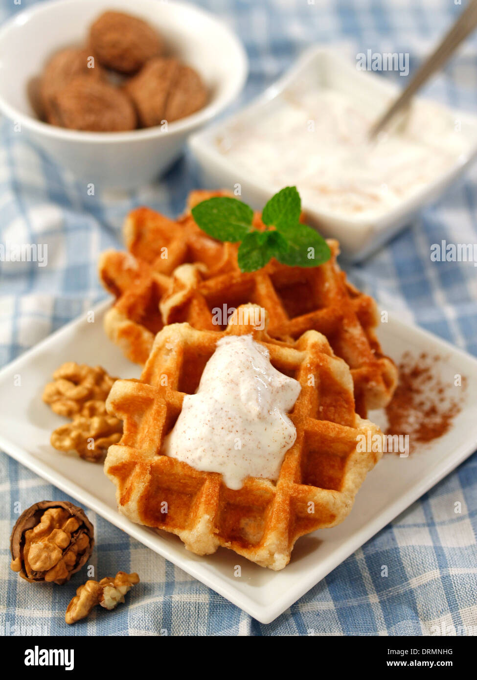 Walnut waffles with cinnamon. Recipe available Stock Photo - Alamy