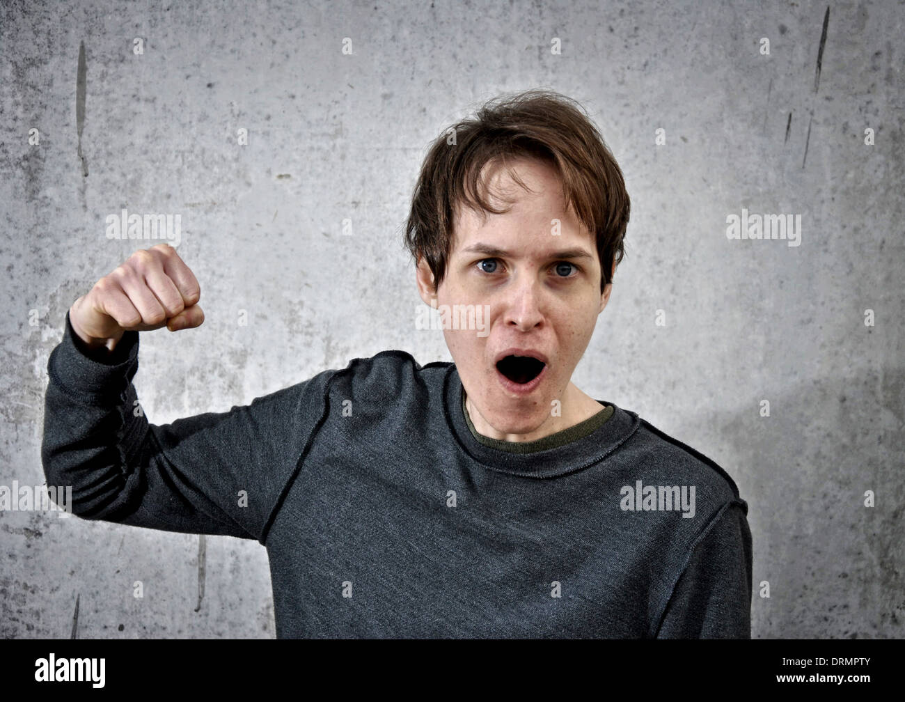 Aggressive man punching hi-res stock photography and images - Alamy