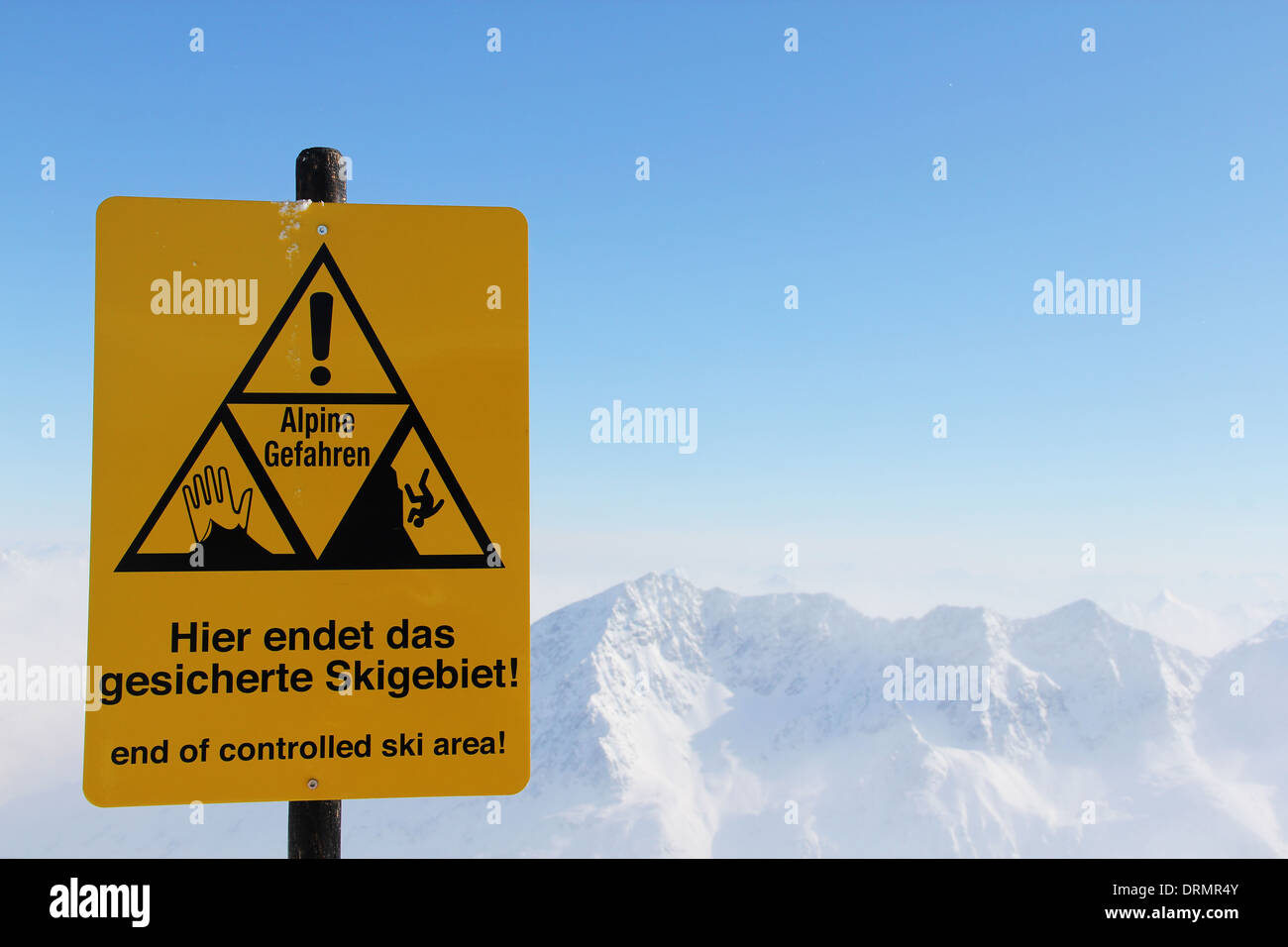 Danger sign in mountains Stock Photo - Alamy