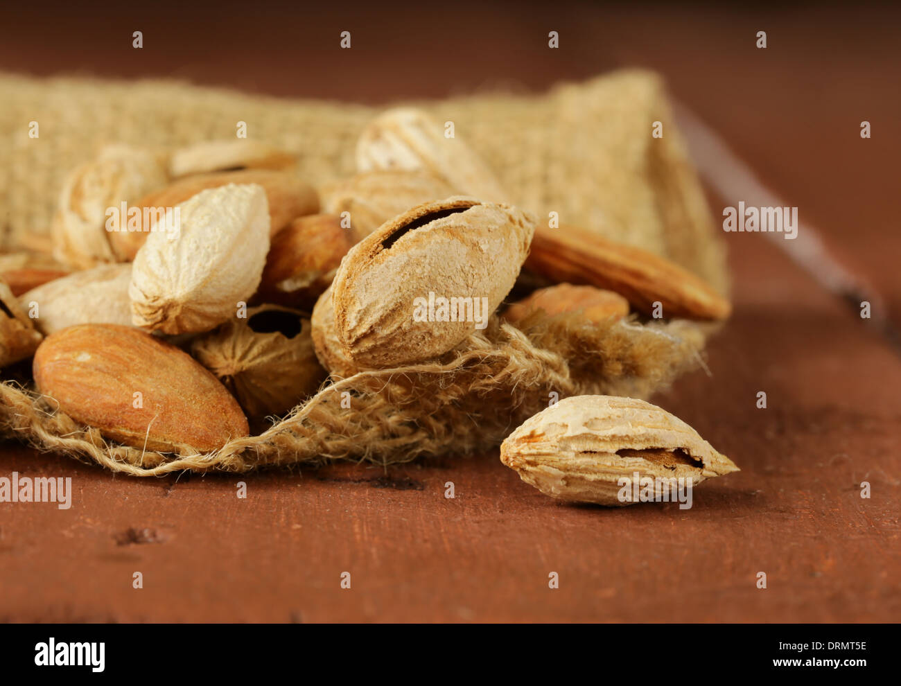 pile of peeled and inshell almonds - delicious and healthy nuts Stock ...