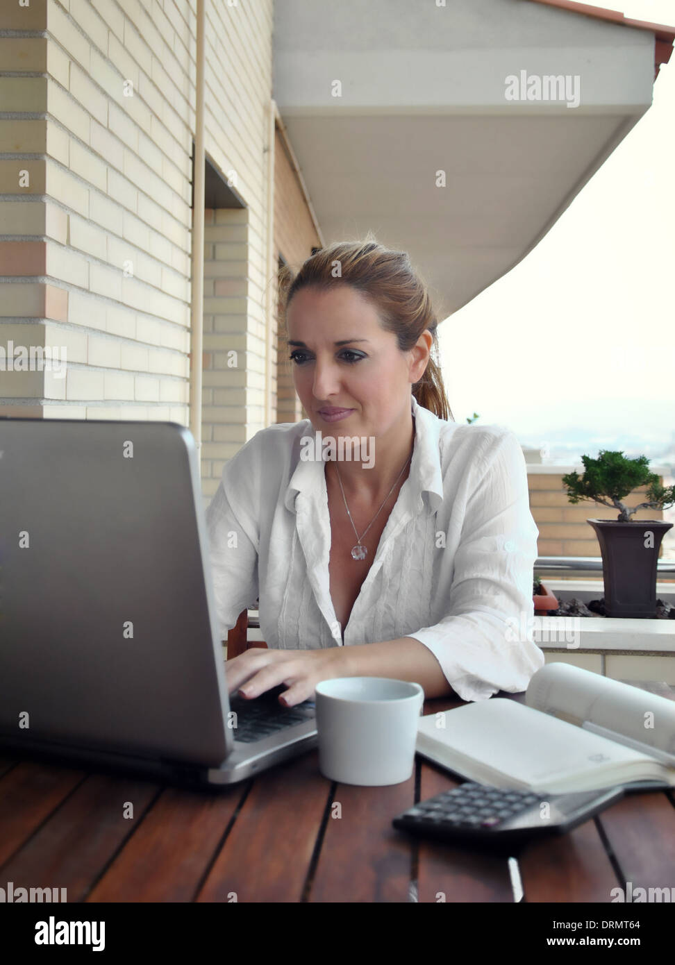 Quietly working hi-res stock photography and images - Alamy